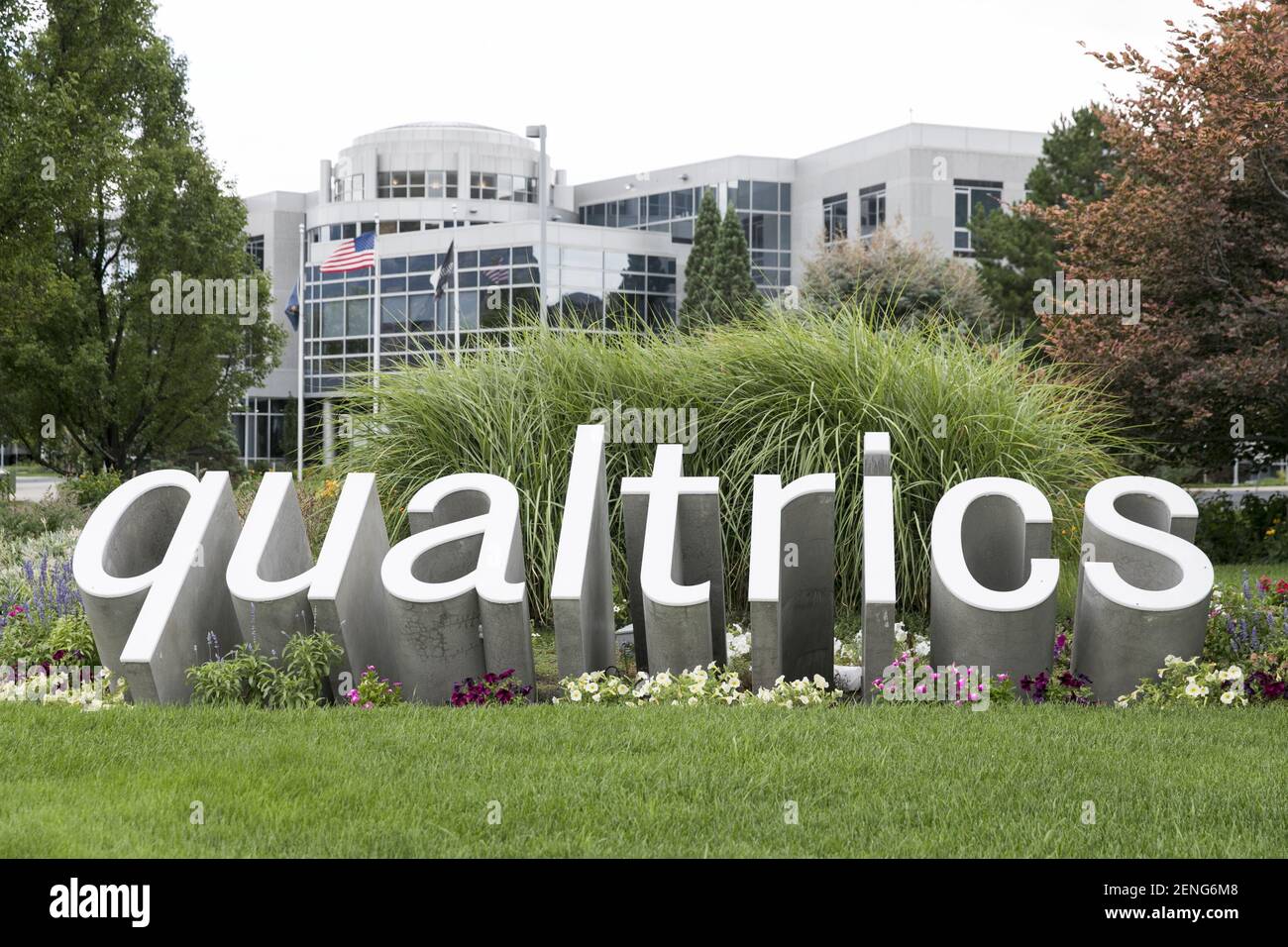 A logo sign outside of the headquarters of Qualtrics in Provo, Utah on ...