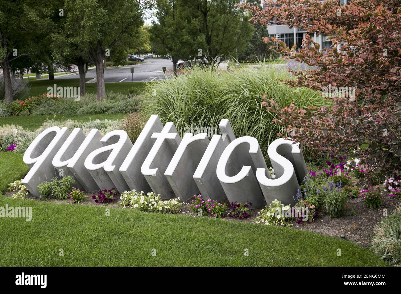 A logo sign outside of the headquarters of Qualtrics in Provo, Utah on ...