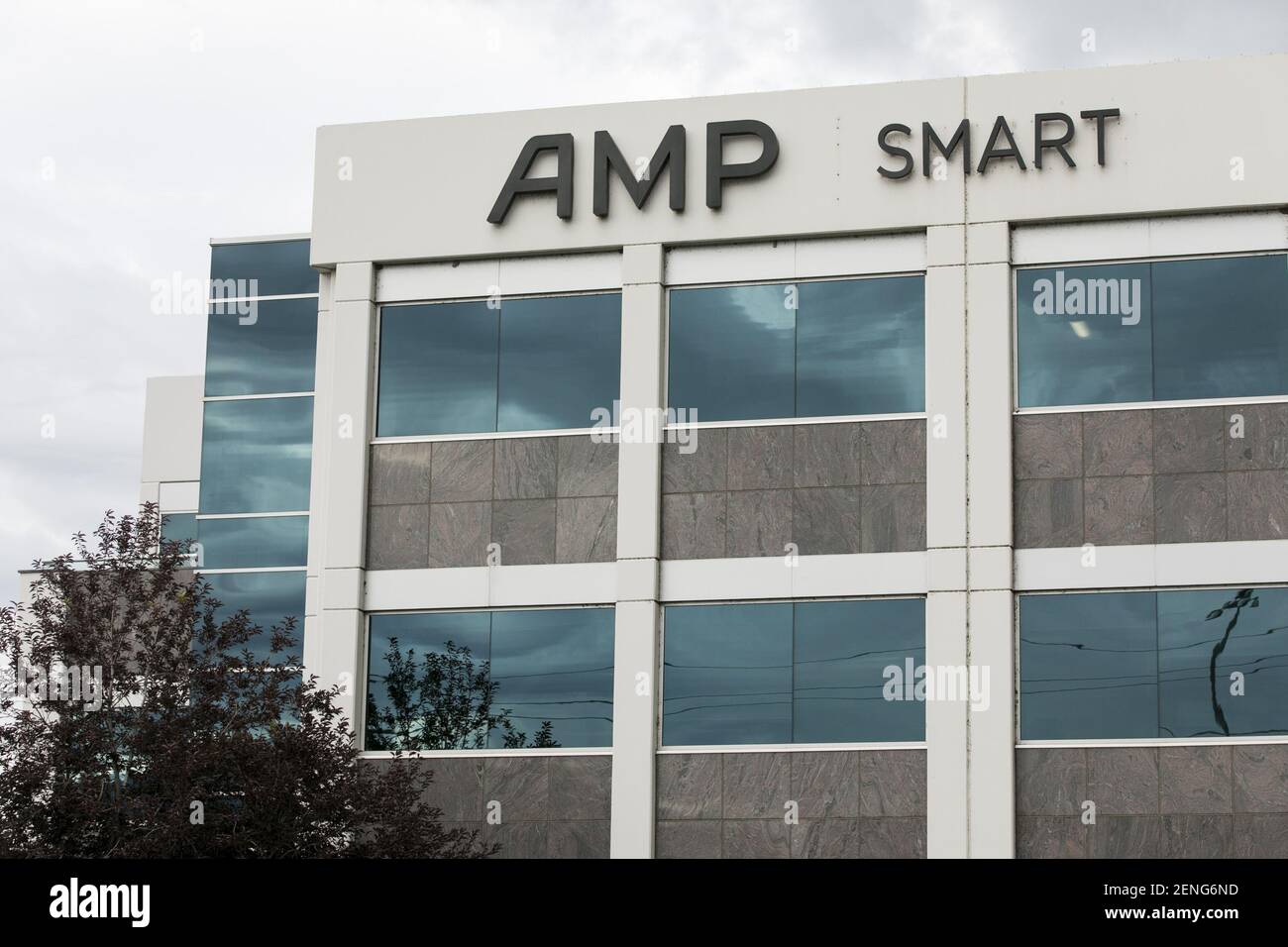 A logo sign outside of the headquarters of AMP Smart in American Fork ...