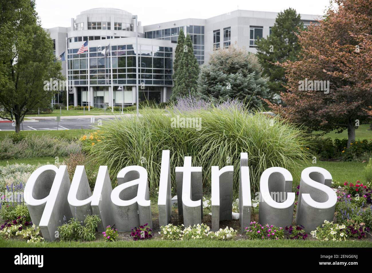 A logo sign outside of the headquarters of Qualtrics in Provo, Utah on ...