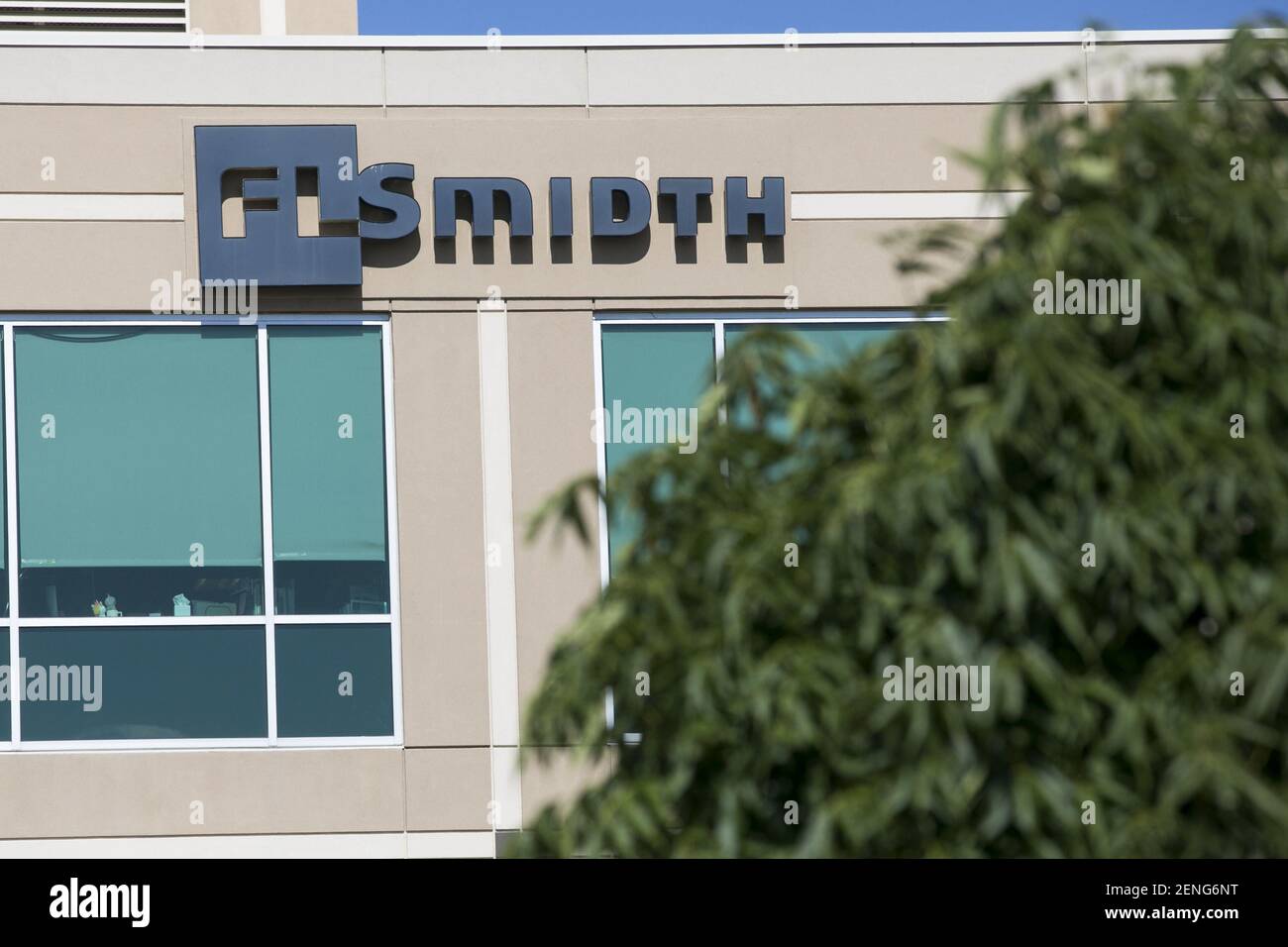 A logo sign outside of a facility occupied by FLSmidth & Co., in ...