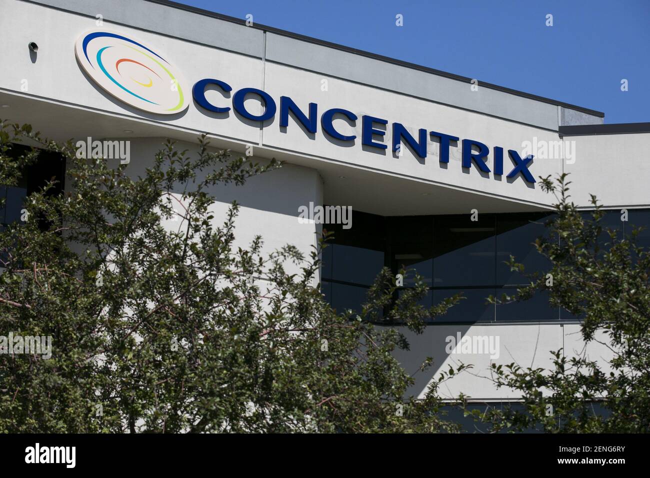 A logo sign outside of a facility occupied by Concentrix in Salt Lake ...