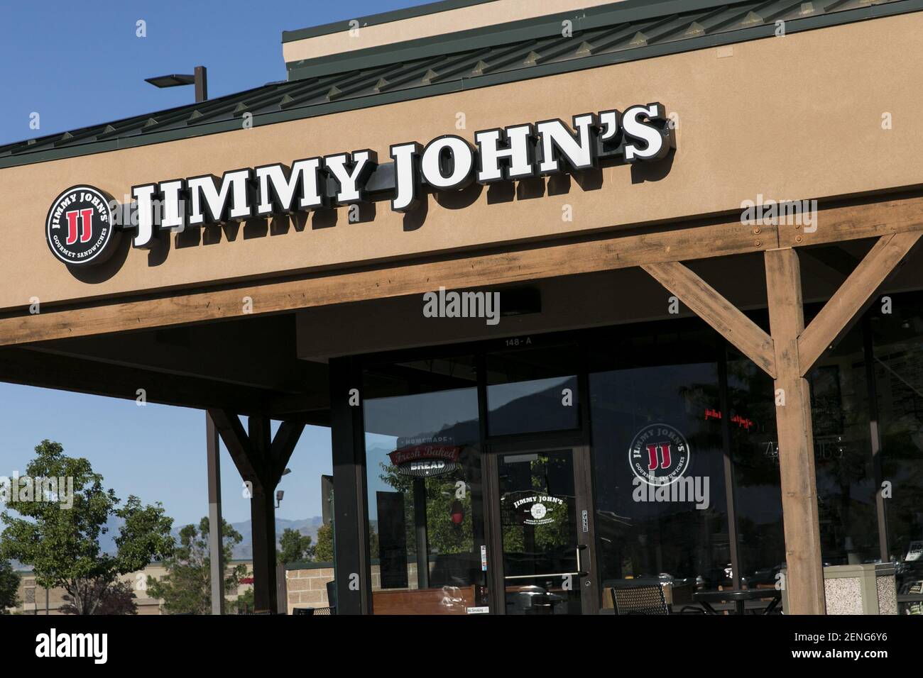 A logo sign outside of a Jimmy John's restaurant location in Draper ...