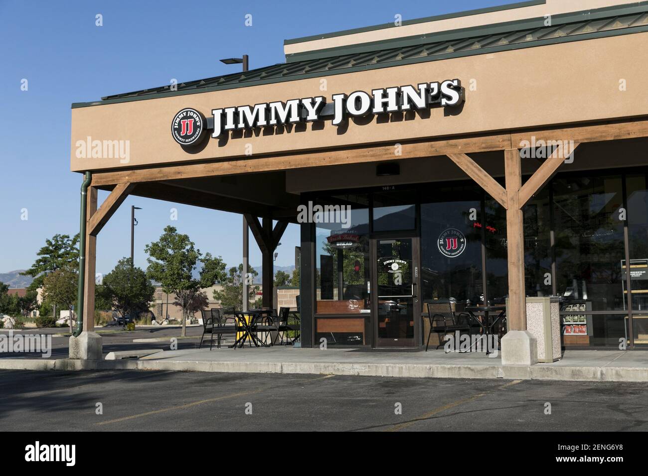 A logo sign outside of a Jimmy John's restaurant location in Draper ...