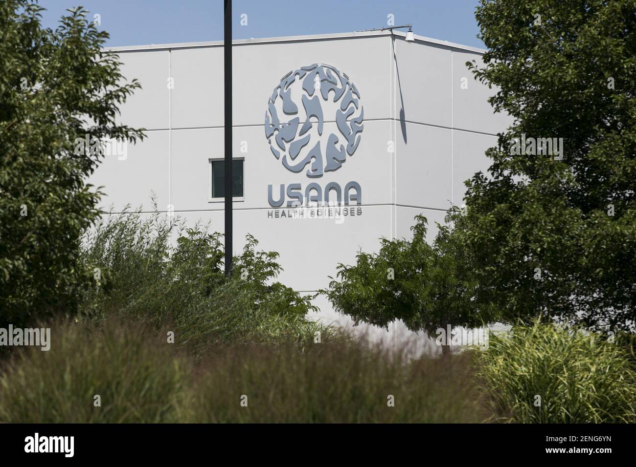 A logo sign outside of the headquarters of Usana Health Sciences, Inc ...
