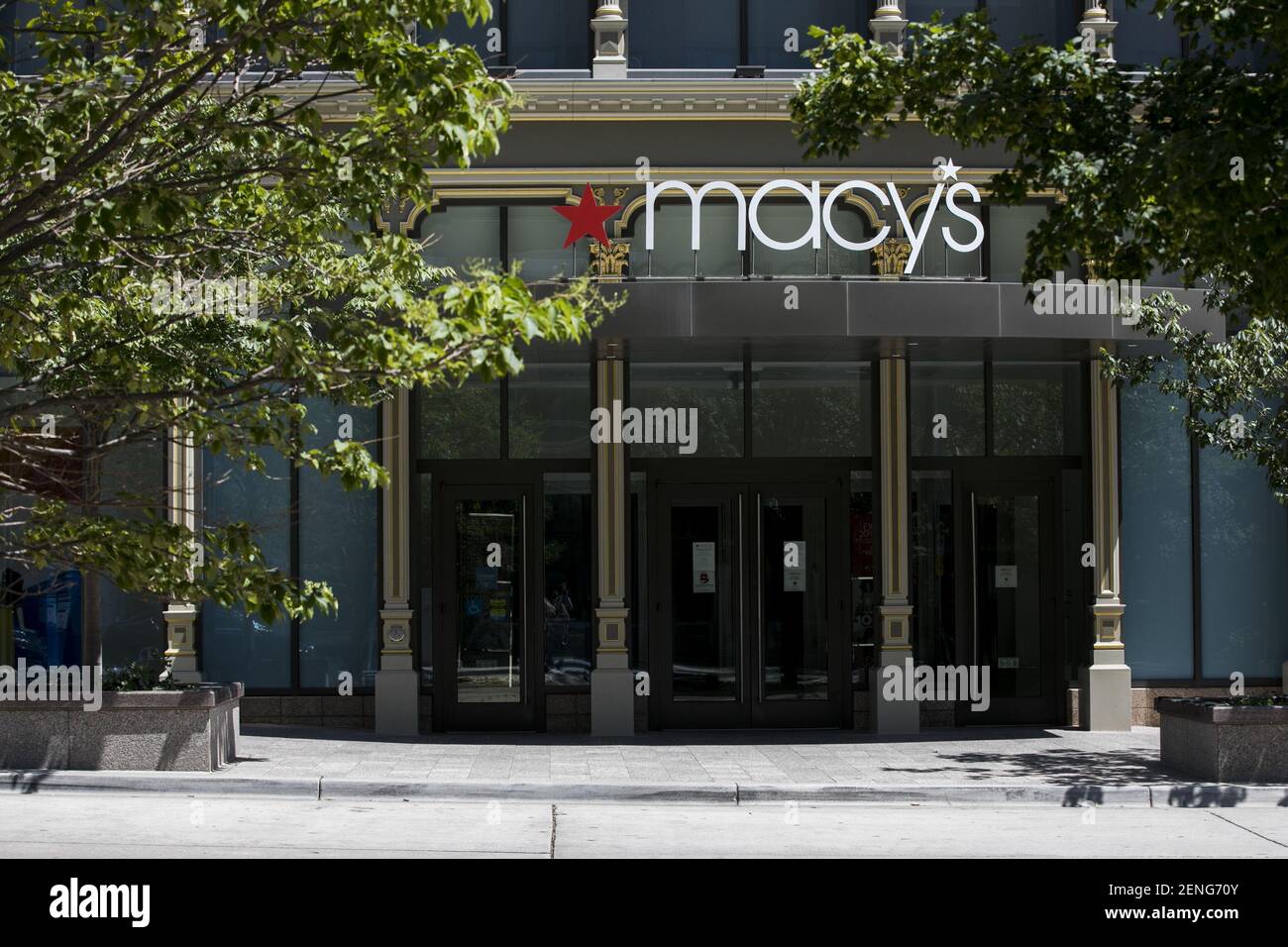 A logo sign outside of a Macy's retail store location in Salt Lake City ...