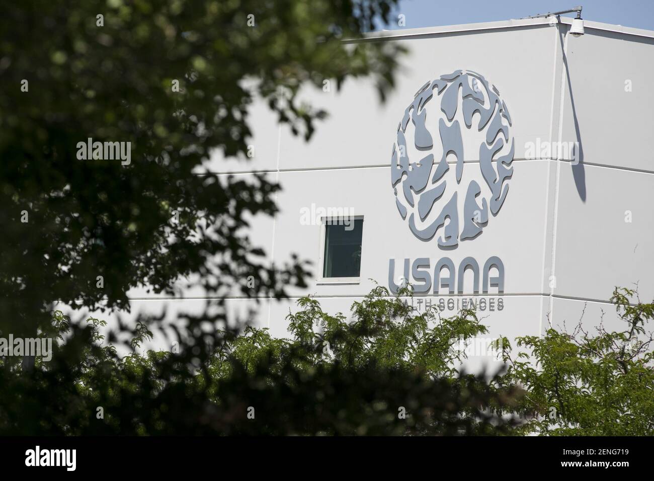 A logo sign outside of the headquarters of Usana Health Sciences, Inc ...