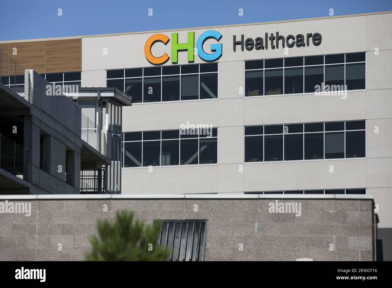A logo sign outside of the headquarters of CHG Healthcare in Midvale ...