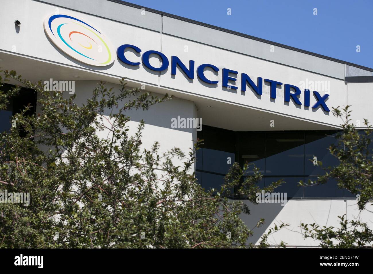 A logo sign outside of a facility occupied by Concentrix in Salt Lake ...