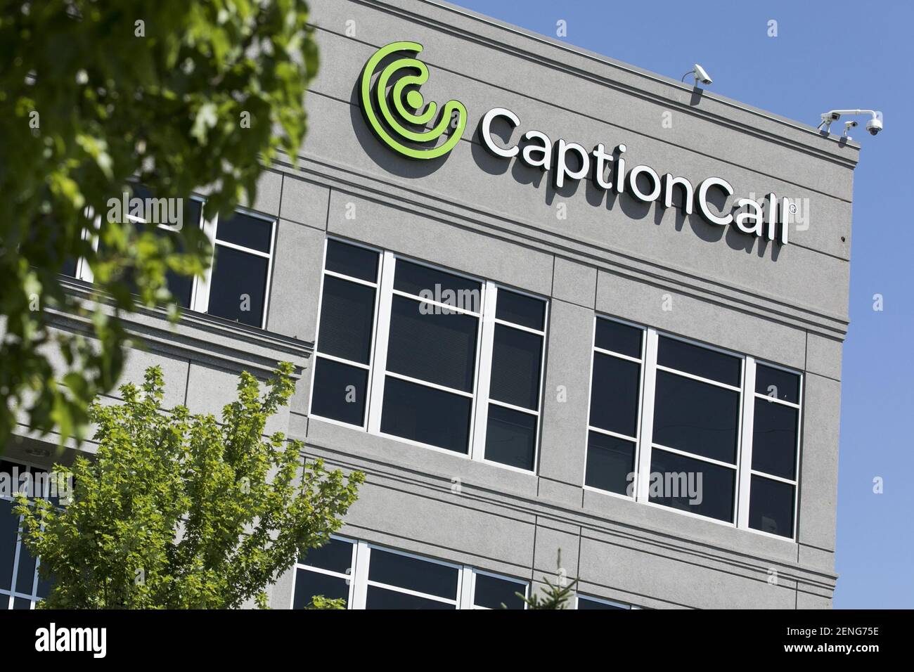 A logo sign outside of the headquarters of CaptionCall in Salt Lake ...