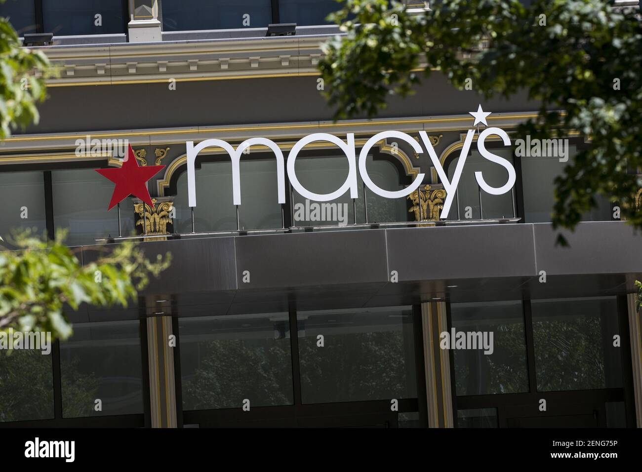 A logo sign outside of a Macy's retail store location in Salt Lake City ...