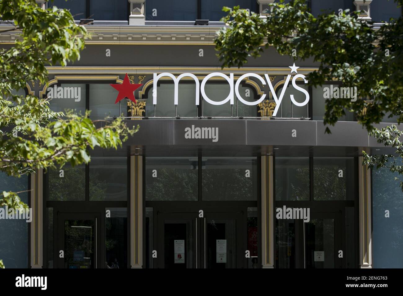A logo sign outside of a Macy's retail store location in Salt Lake City ...