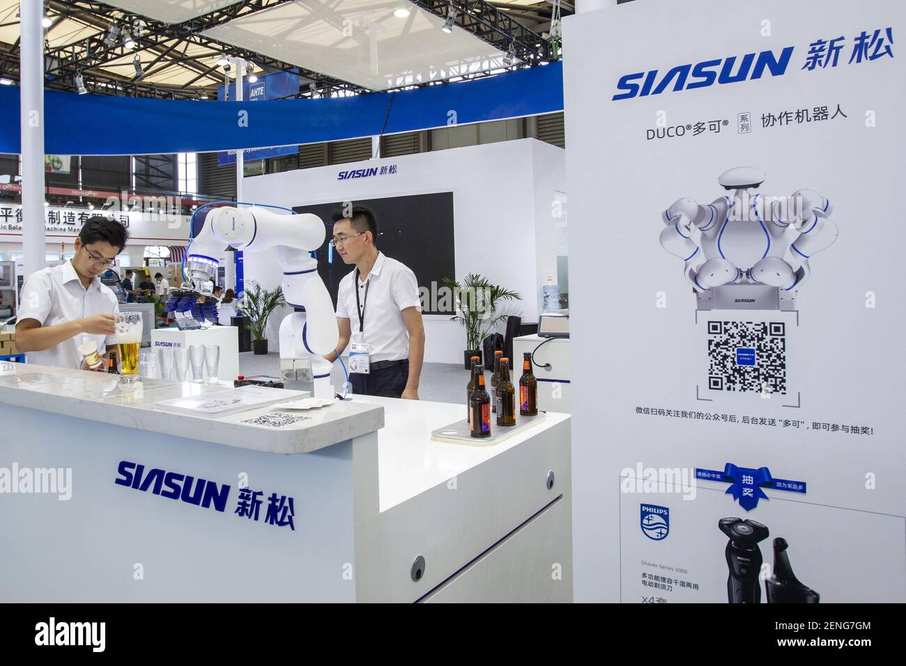 --FILE--People visit the stand of Siasun Robot & Automation Co during ...