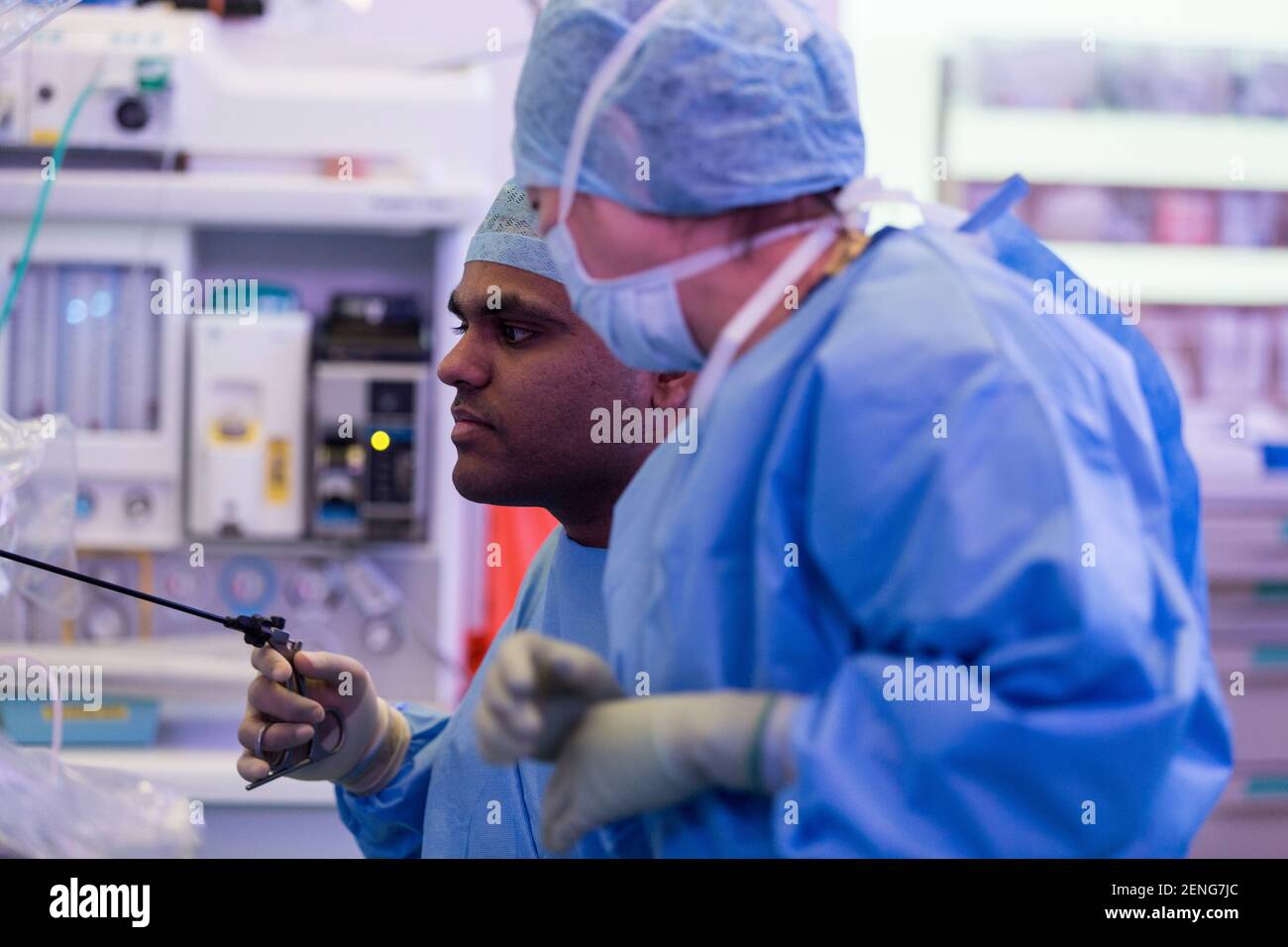 Surgeons perform an operation in an nhs hospital hi-res stock ...