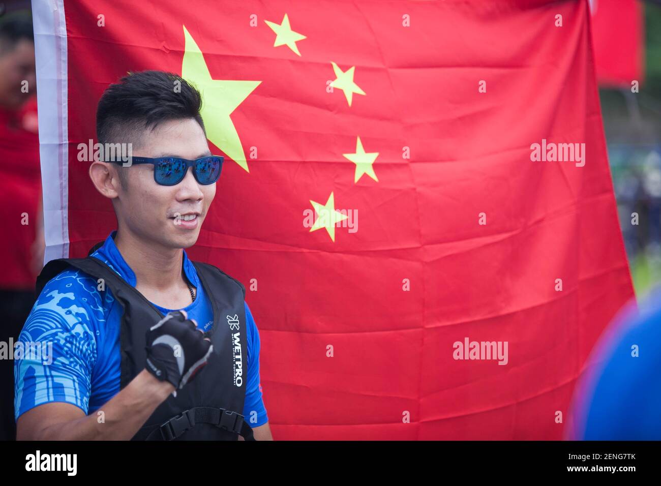 Police officers and firefighters attend the dragon boat races during ...