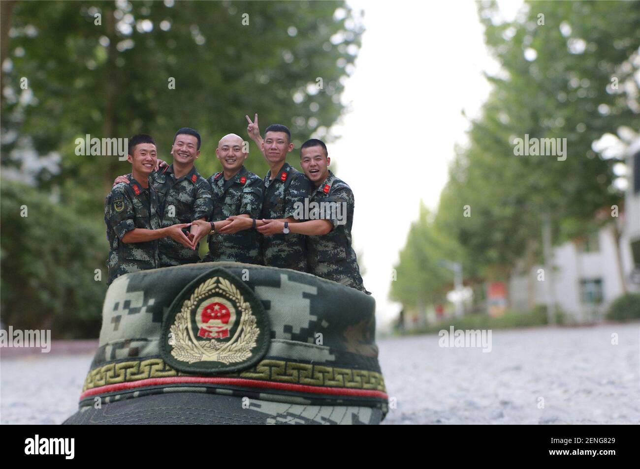 Chinese paramilitary policemen pose for creative photos to mark their ...