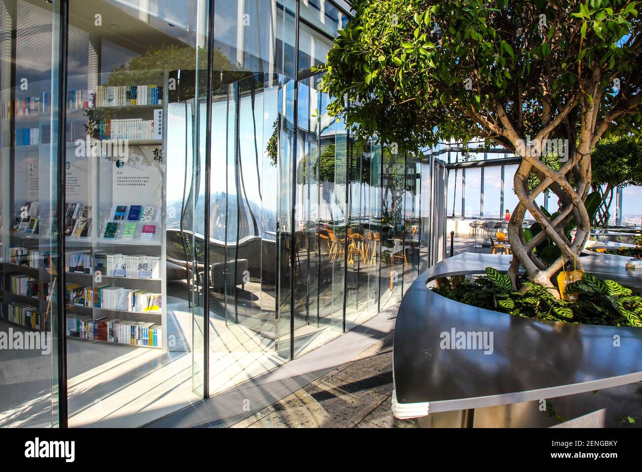 **CAPTION CORRECTION**Books are placed in the 52nd-storey Duoyun ...