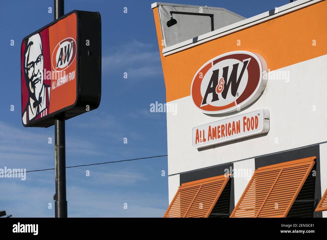 A logo sign outside of a A&W fast food restaurant location in American ...
