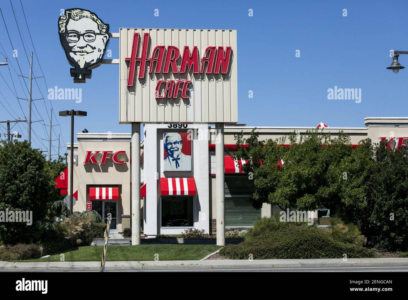 A Harlan Cafe logo sign outside of the first Kentucky Fried Chicken ...