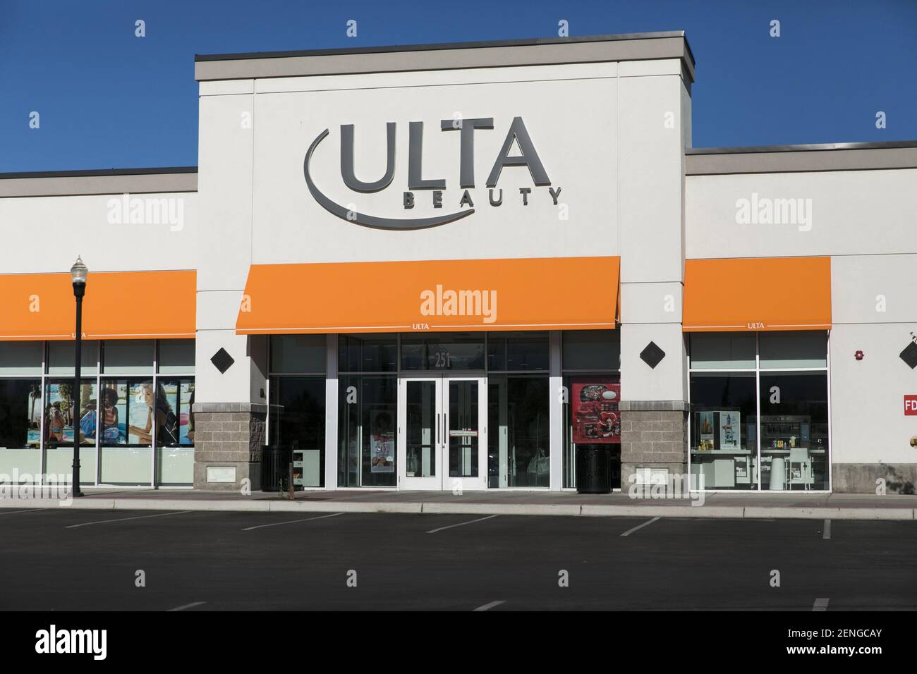 A logo sign outside of a Ulta Beauty retail store location in American ...