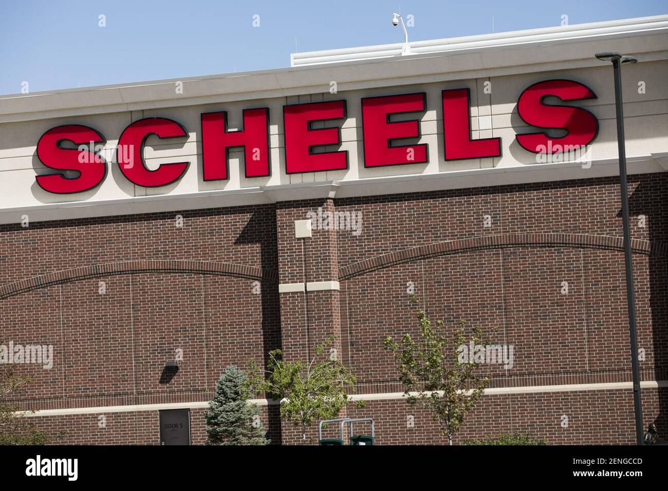 A logo sign outside of a SCHEELS retail store location in Sandy, Utah ...