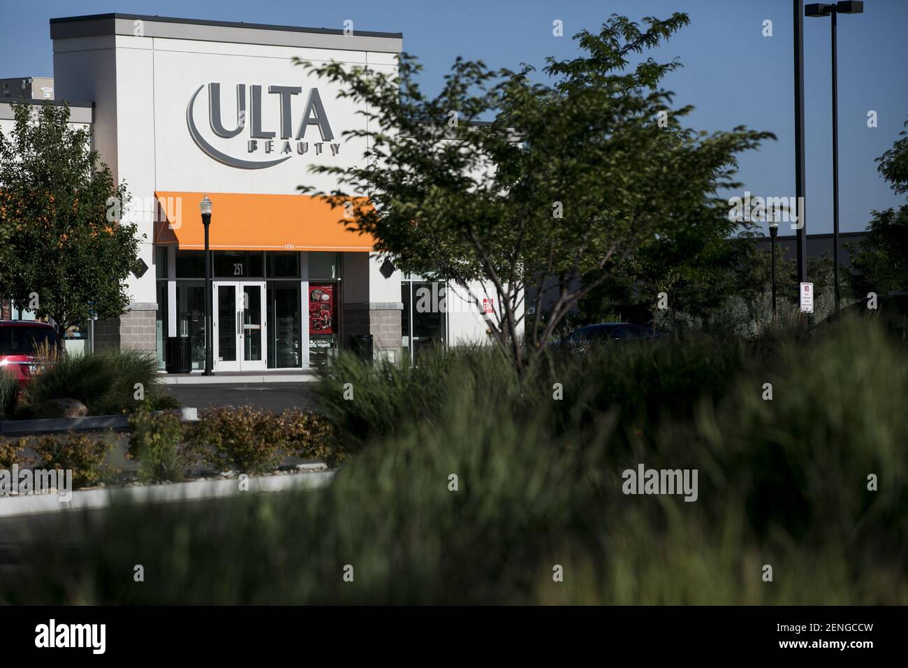 A logo sign outside of a Ulta Beauty retail store location in American ...