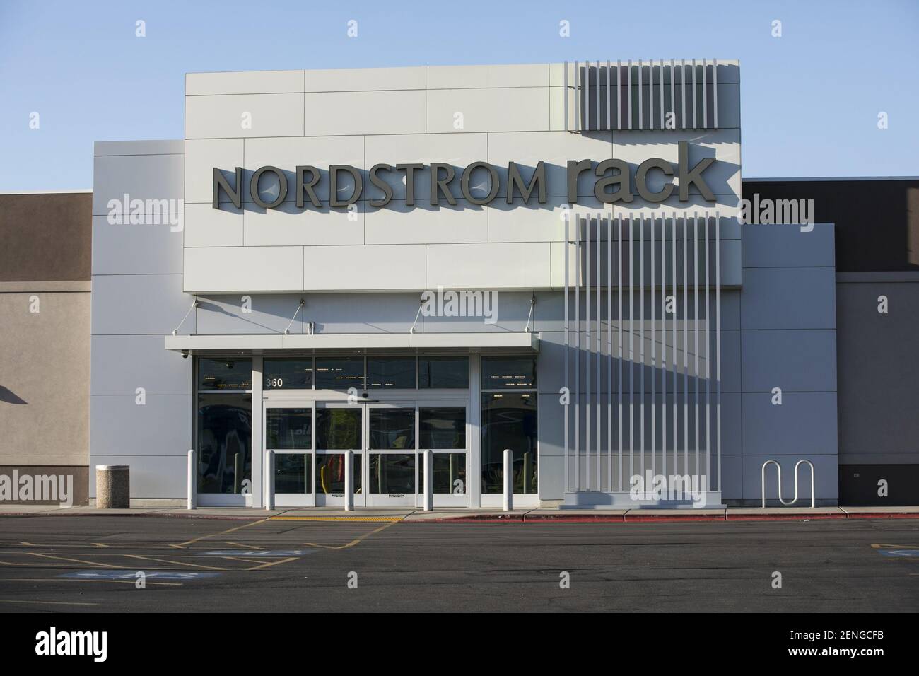 A logo sign outside of a Nordstrom Rack retail store location in Orem ...