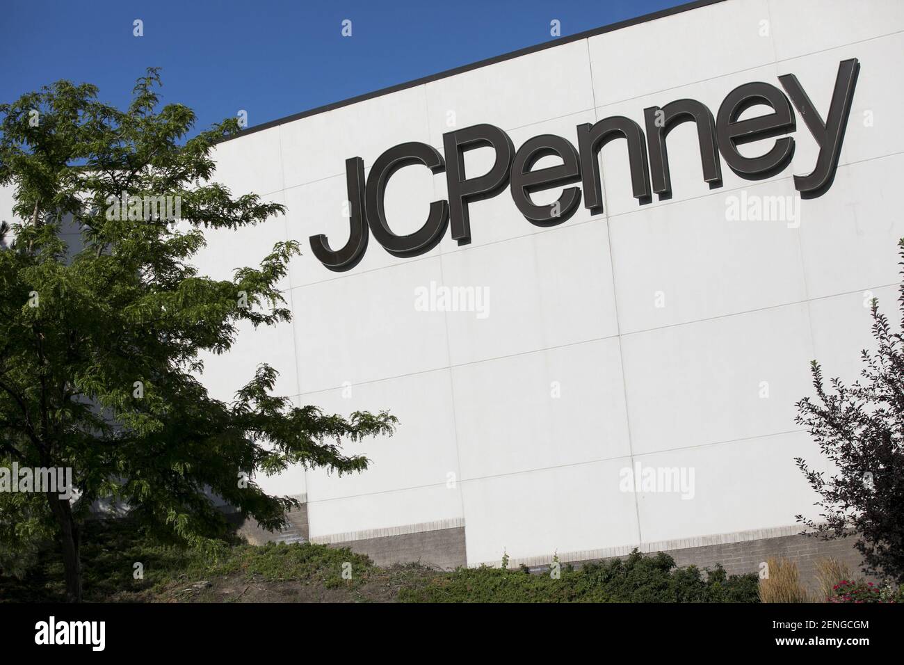 A logo sign outside of a JC Penney retail store location in Provo, Utah ...