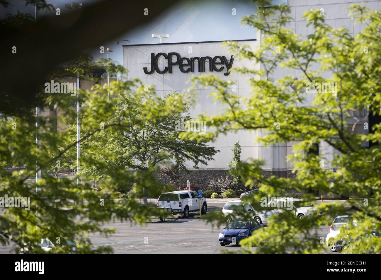 A logo sign outside of a JC Penney retail store location in Provo, Utah ...