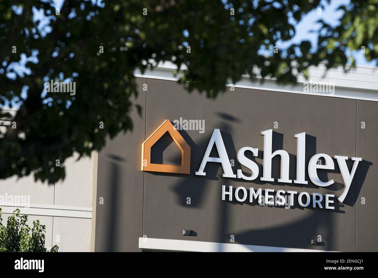 A logo sign outside of a Ashley Homestore retail store location in Orem ...