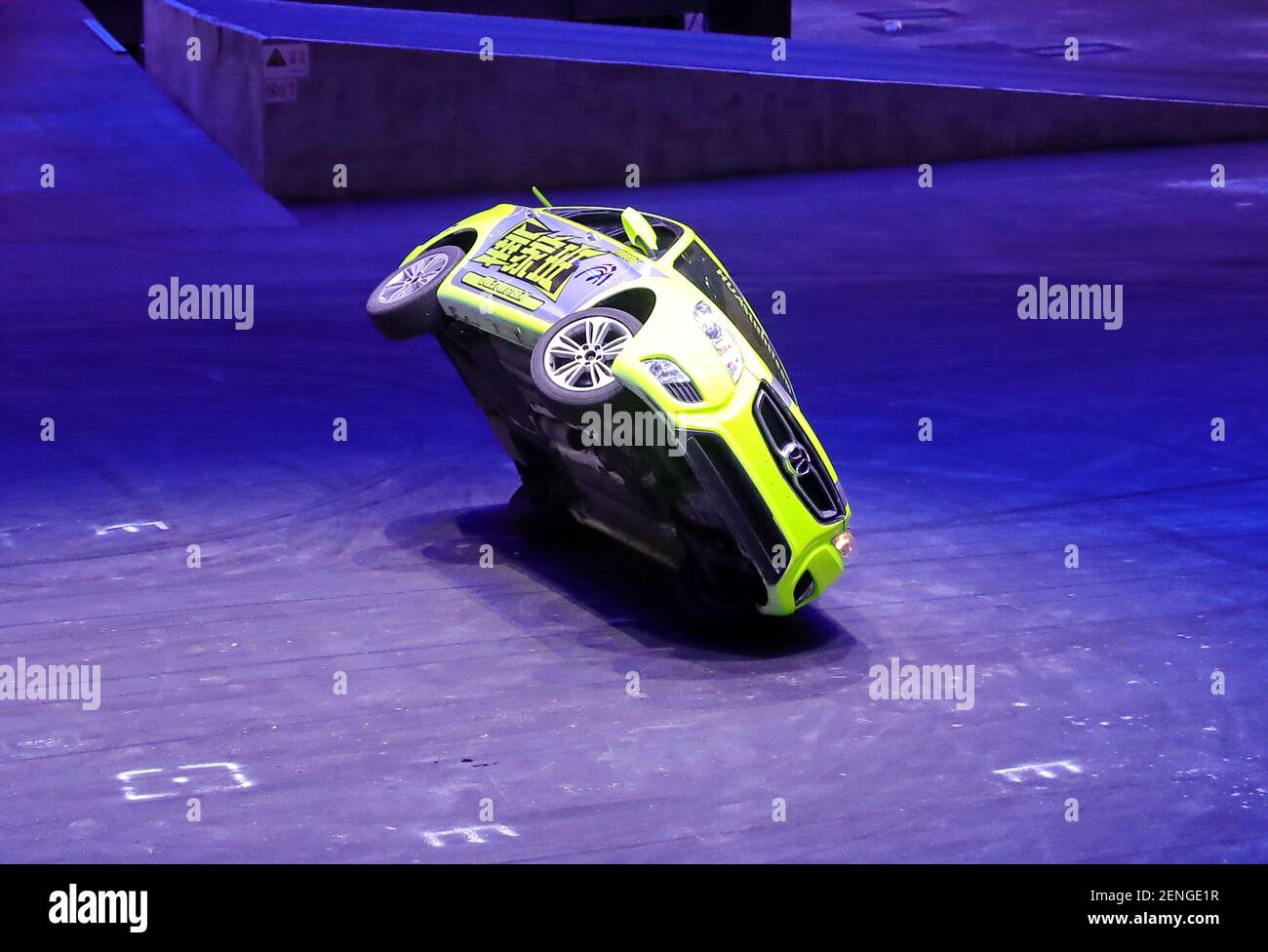 Members of car racing acrobatic teams perform during the reopening ...