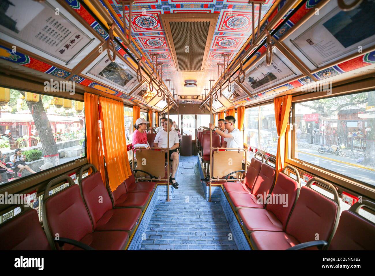 Passengers experience the old-fashioned bus in Xi’an city, northwest ...