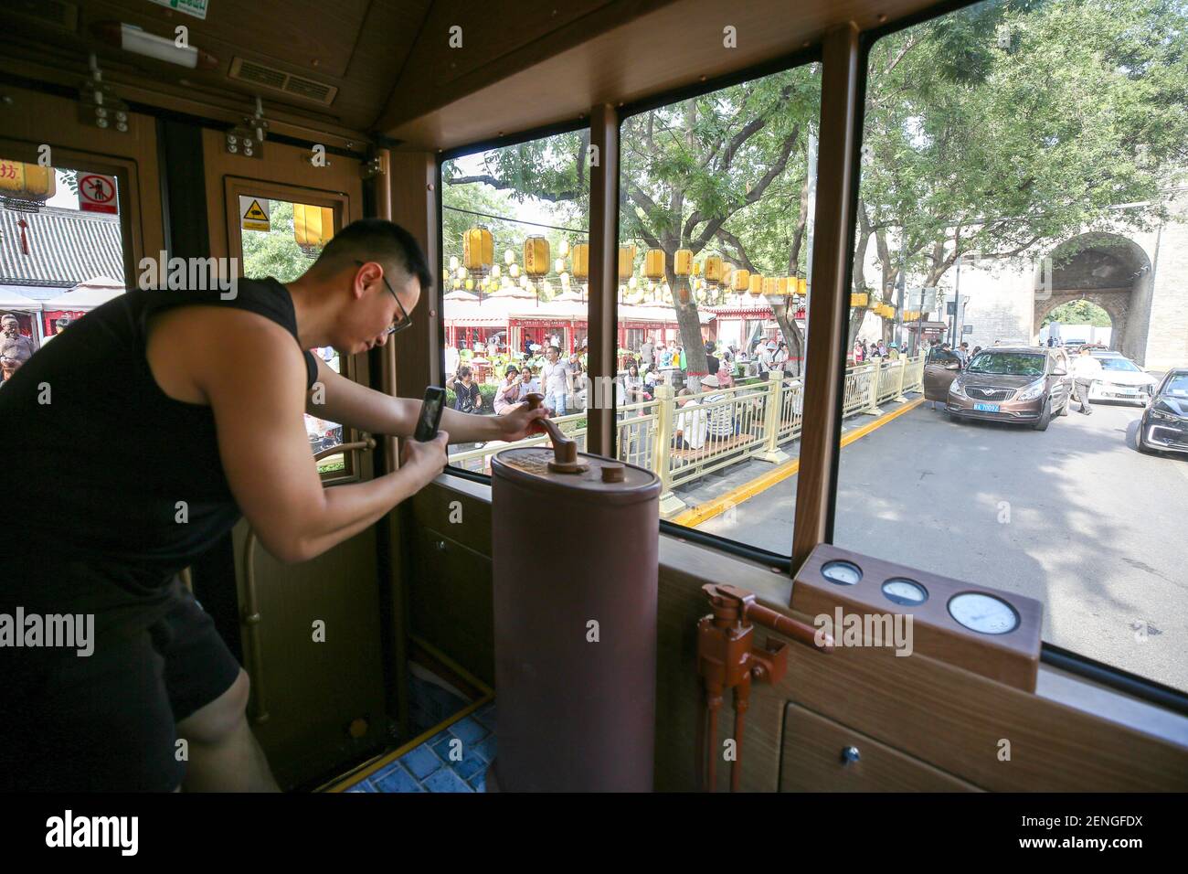 Passengers experience the old-fashioned bus in Xi’an city, northwest ...