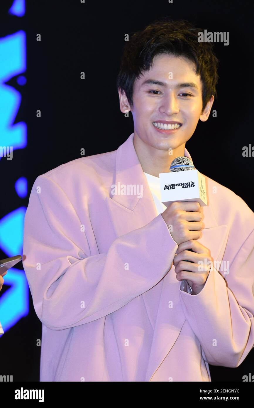 Chinese actor Zhang Zhehan, wearing pink suit, interacts with concert ...