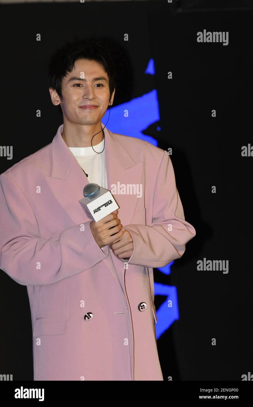 Chinese actor Zhang Zhehan, wearing pink suit, interacts with concert ...
