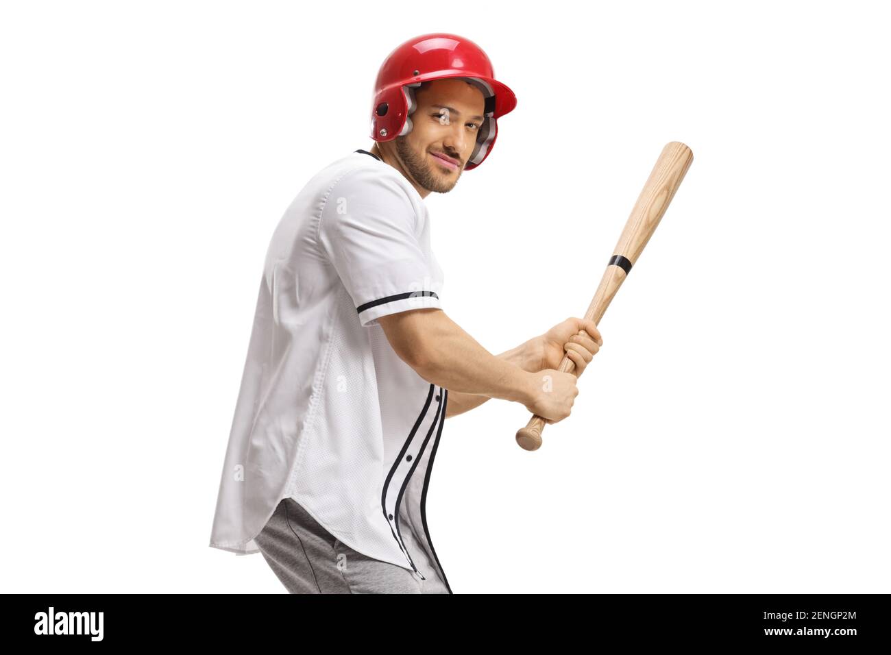Guy playing baseball and holding a bat isolated on white background ...