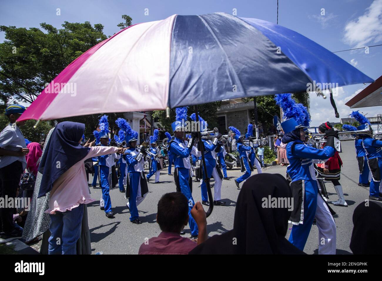 Bands march during the 74th Independence Day carnival in Lhokseumawe ...