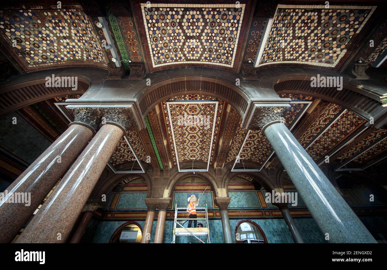 Specialist Stephen Hartley cleans ornate features in the Tiled Hall at ...