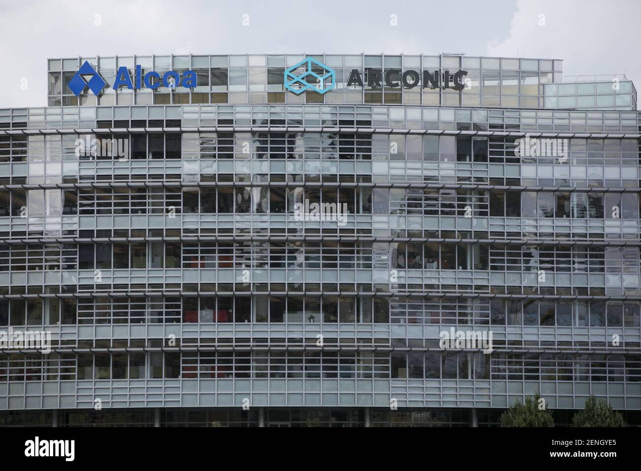 A logo sign outside of the headquarters of the Alcoa Corporation and ...