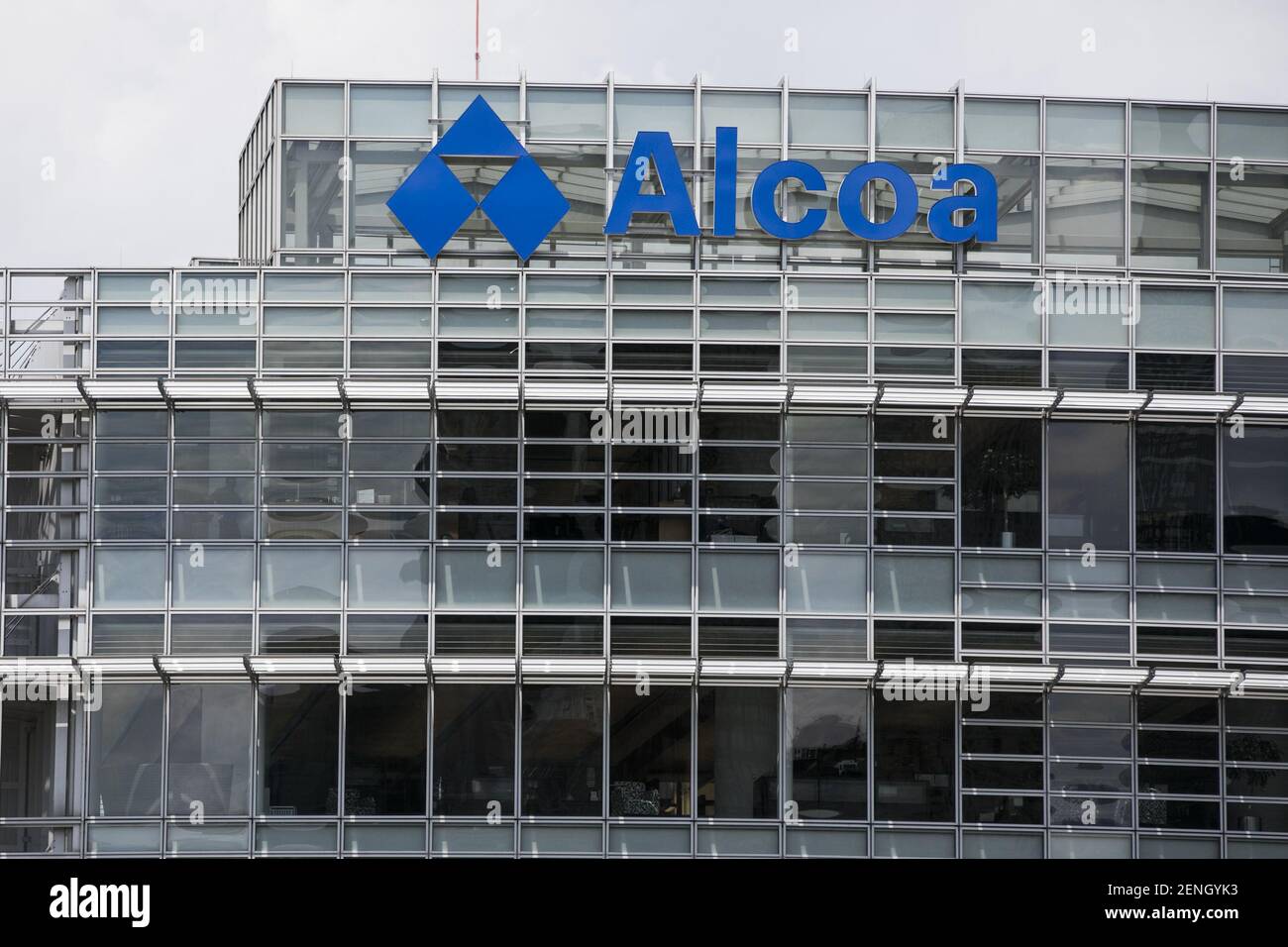 A logo sign outside of the headquarters of the Alcoa Corporation in ...