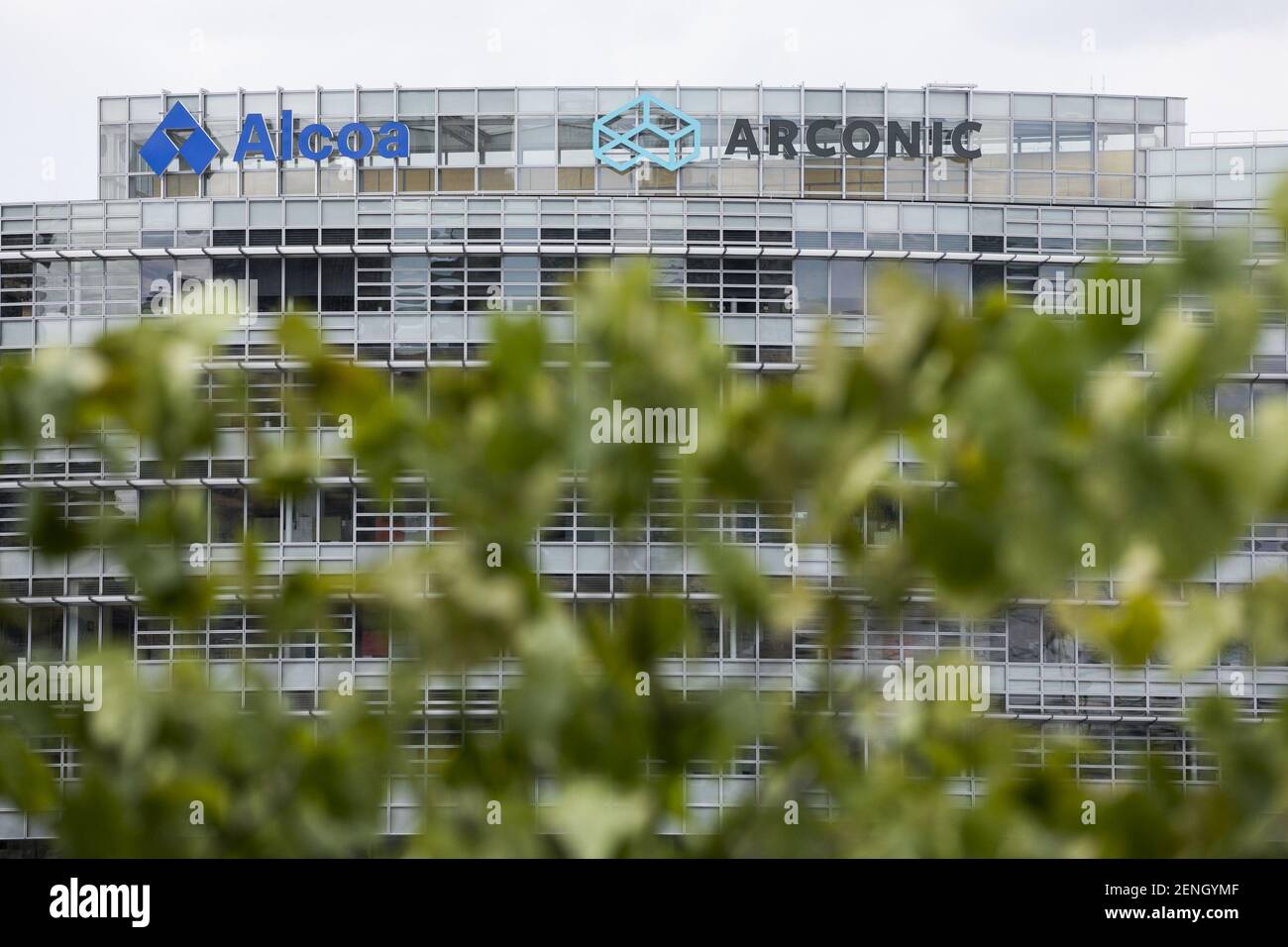 A logo sign outside of the headquarters of the Alcoa Corporation and ...