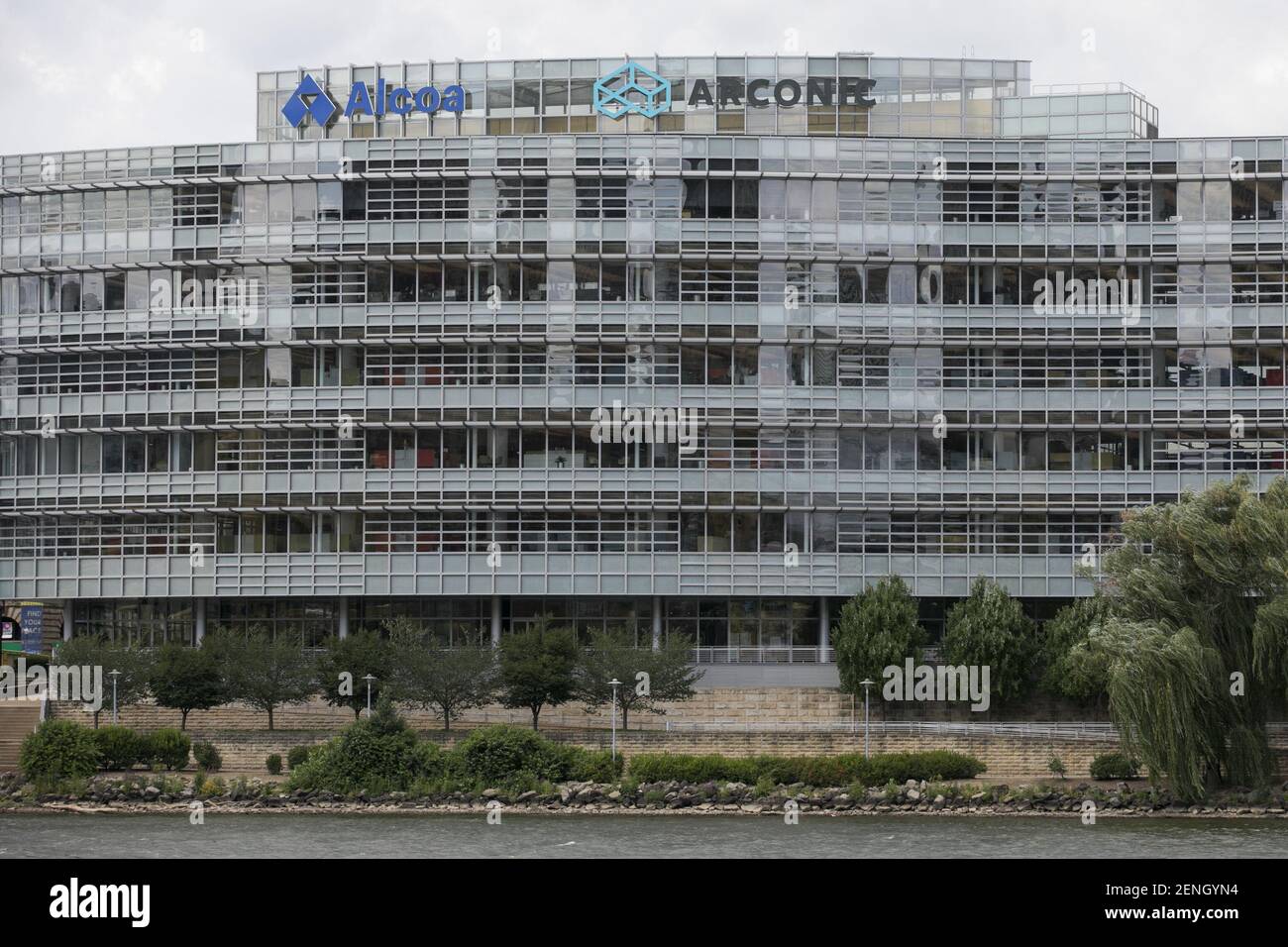 A logo sign outside of the headquarters of the Alcoa Corporation and ...