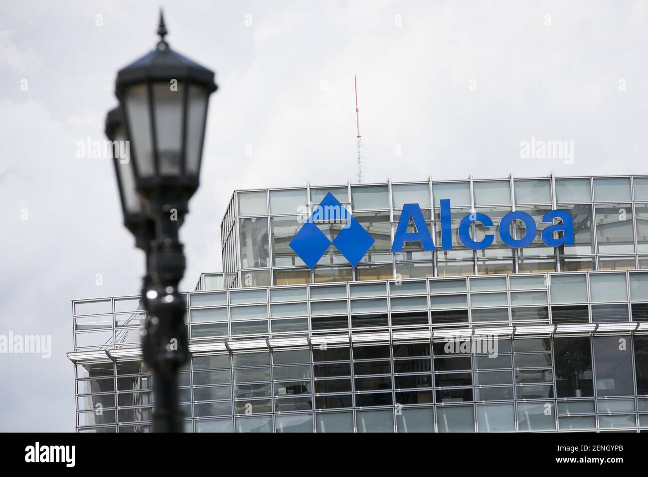 A logo sign outside of the headquarters of the Alcoa Corporation in ...