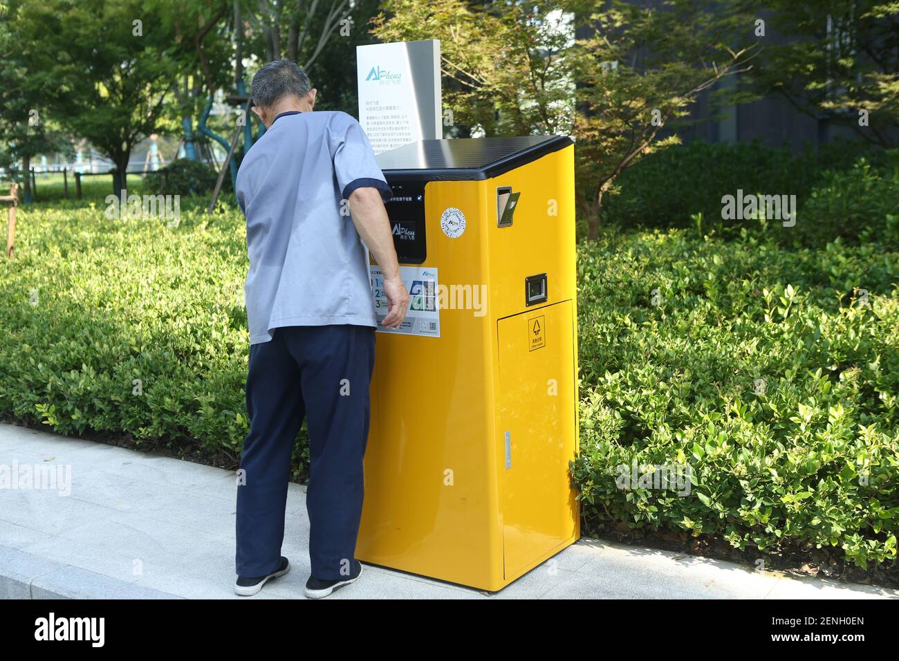 An artificial intelligence (AI) garbage sorting bin is displayed at ...