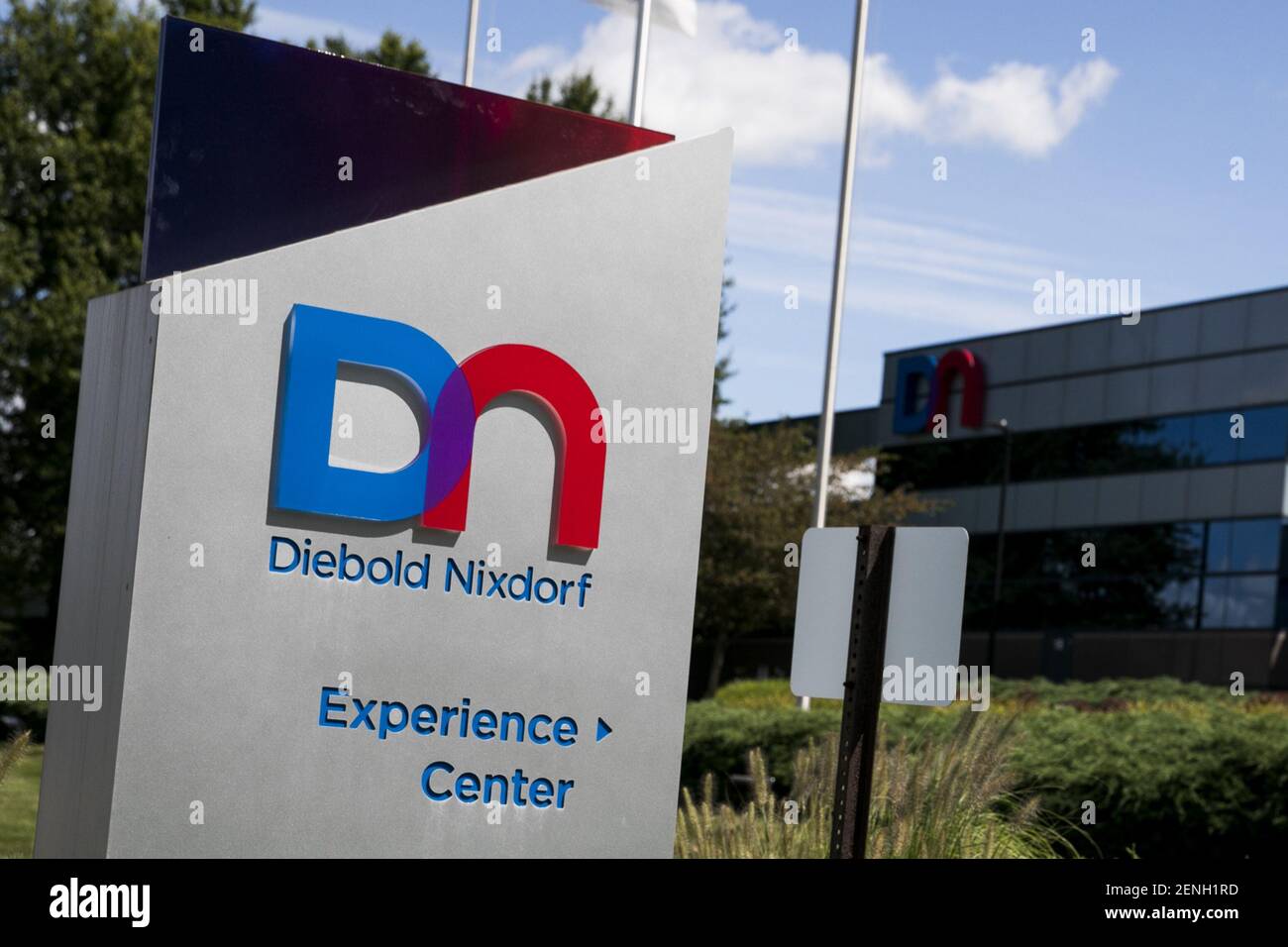 A logo sign outside of the headquarters of Diebold Nixdorf in North ...