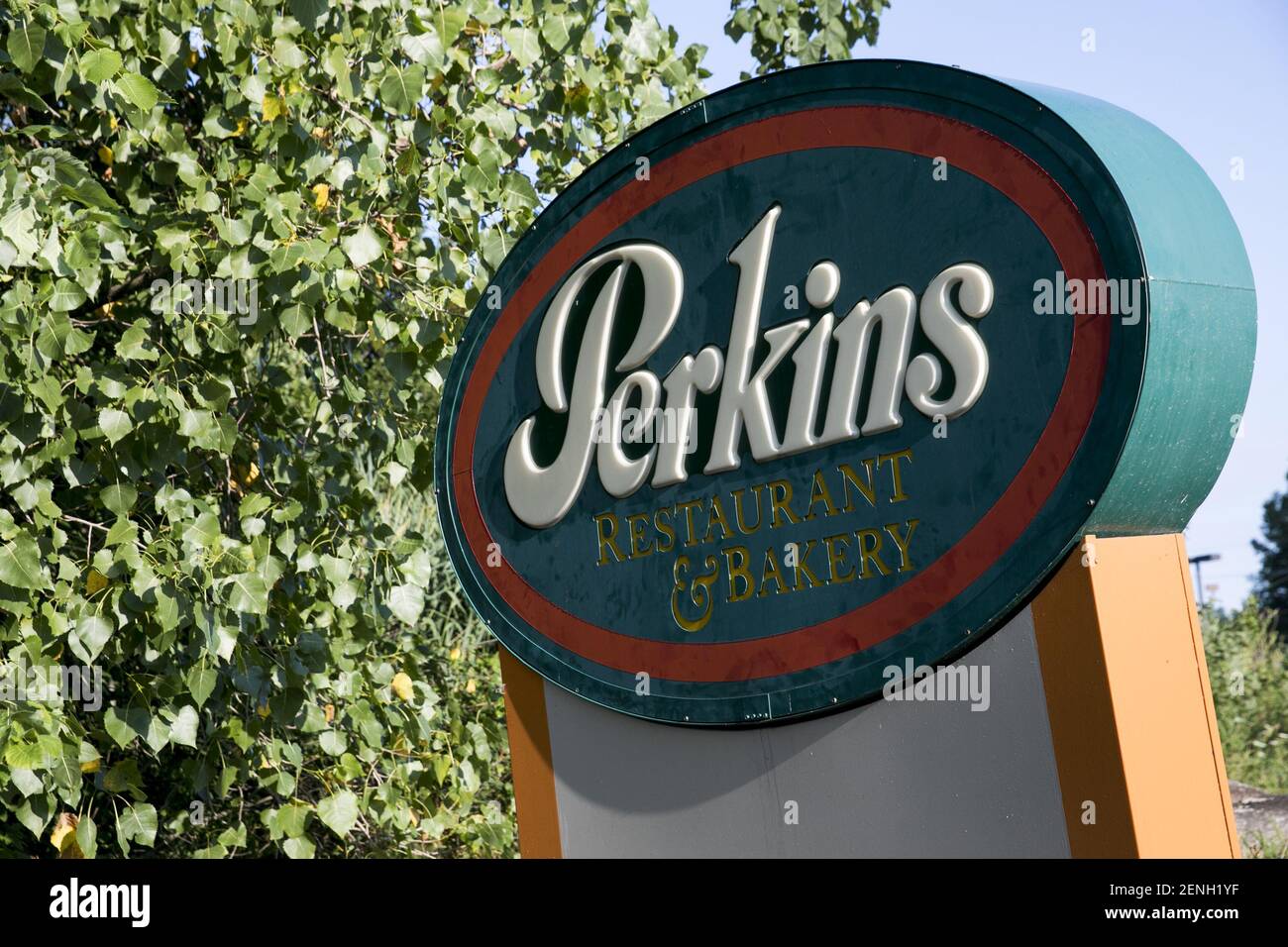 A logo sign outside of a Perkins Restaurant & Bakery location in Avon ...