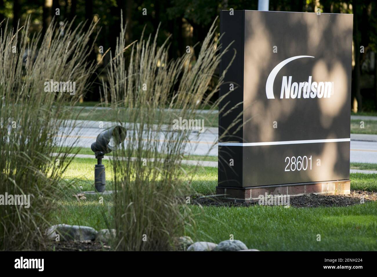 A logo sign outside of the headquarters of the Nordson Corporation in ...