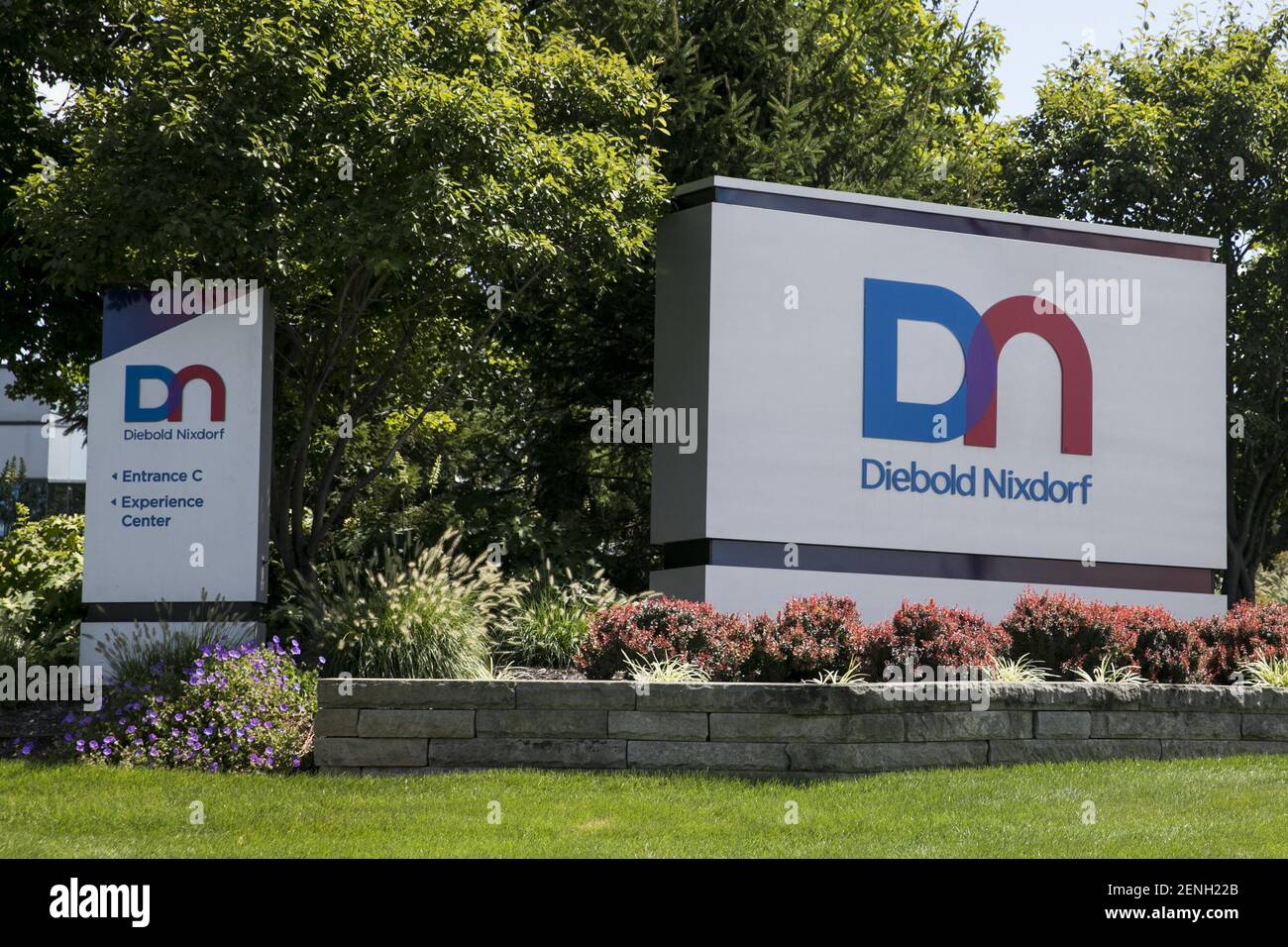 A logo sign outside of the headquarters of Diebold Nixdorf in North ...