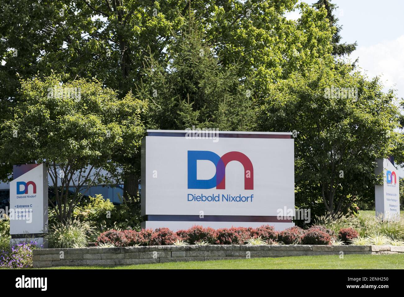 A logo sign outside of the headquarters of Diebold Nixdorf in North ...