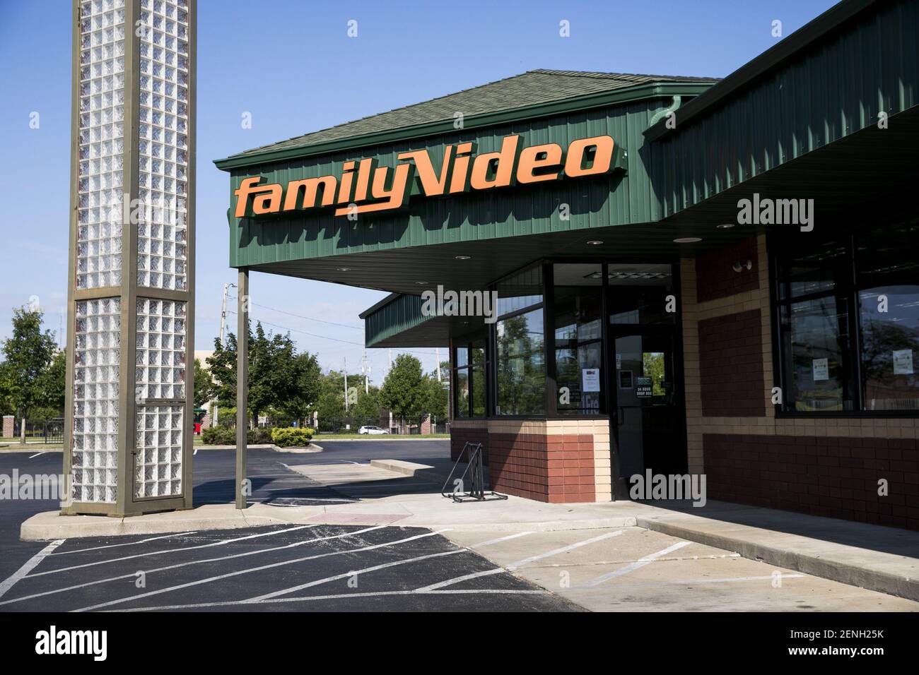 A logo sign outside of a Family Video retail store location in Elyria ...